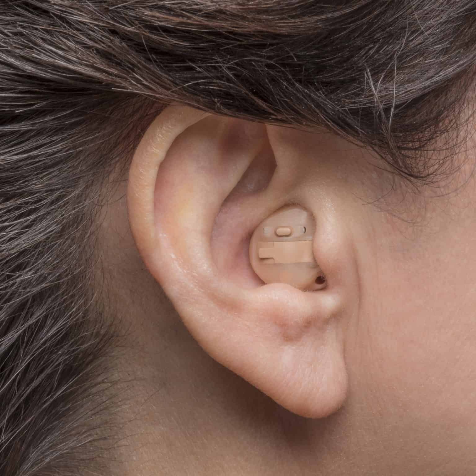 How to Put In and Insert Hearing Aids Into Your Ears